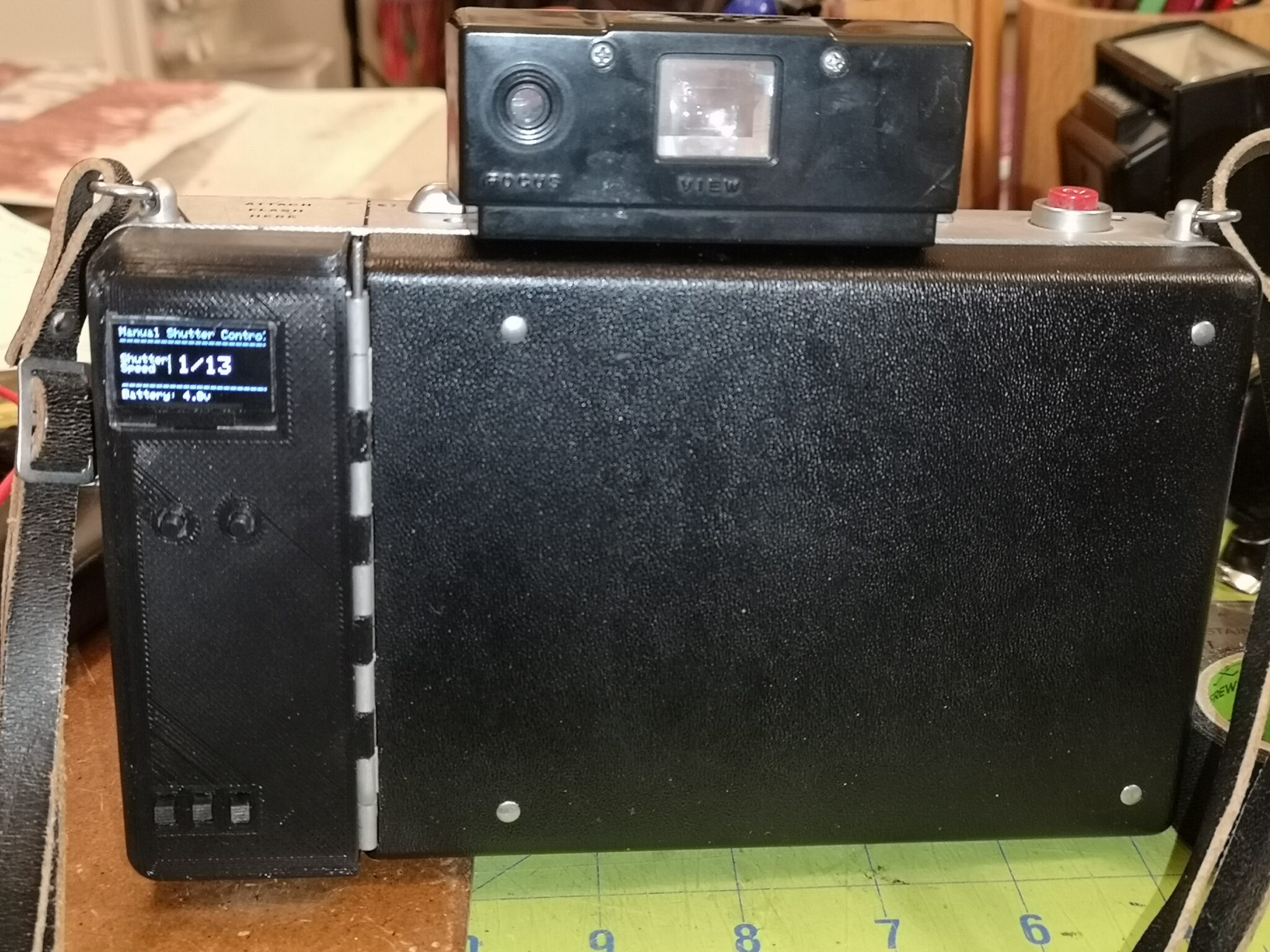 Controlling the shutter on an automatic Polaroid pack camera - 35mmc